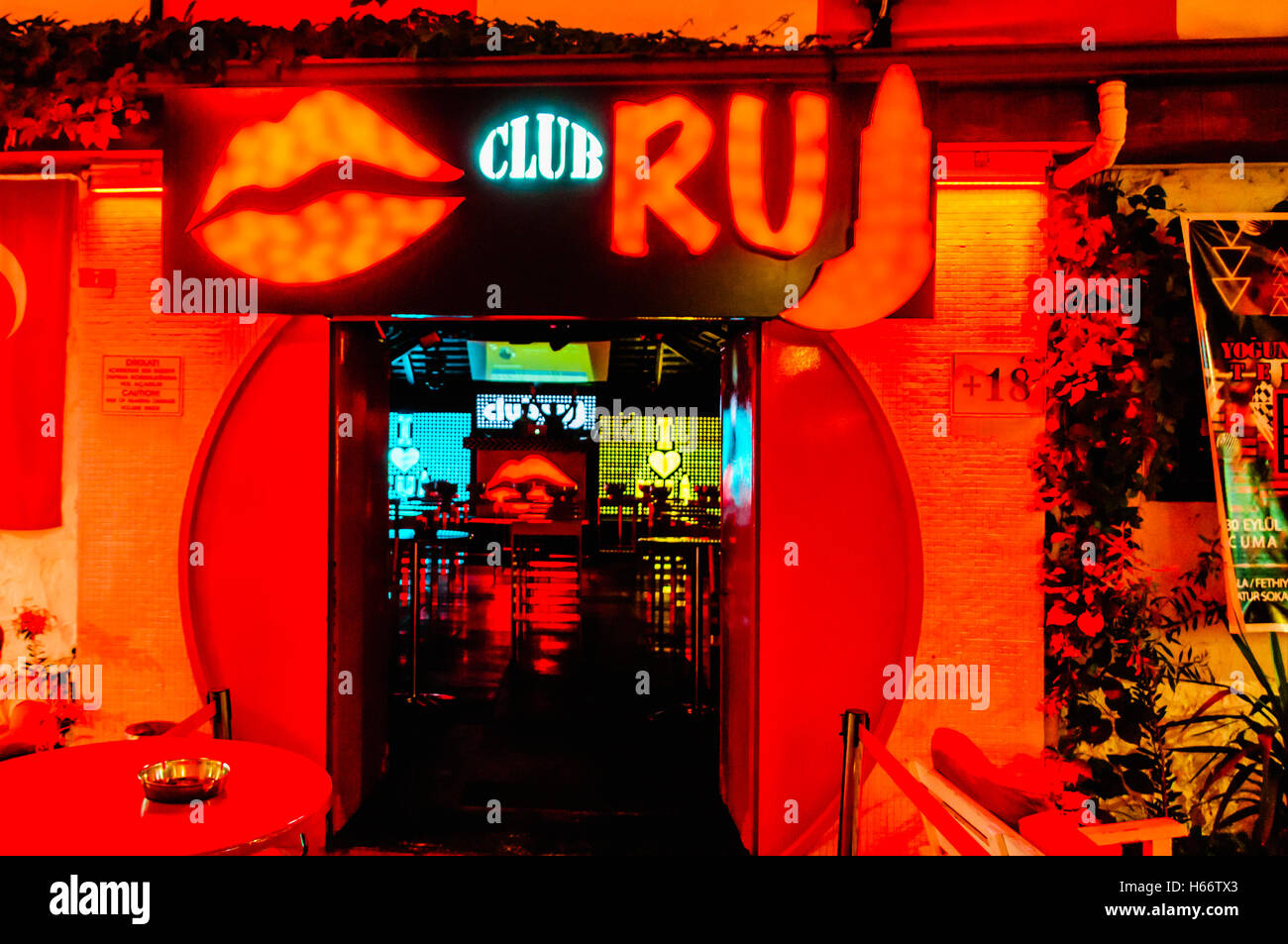 Adult night club with red lights and LED screens inside Stock Photo - Alamy