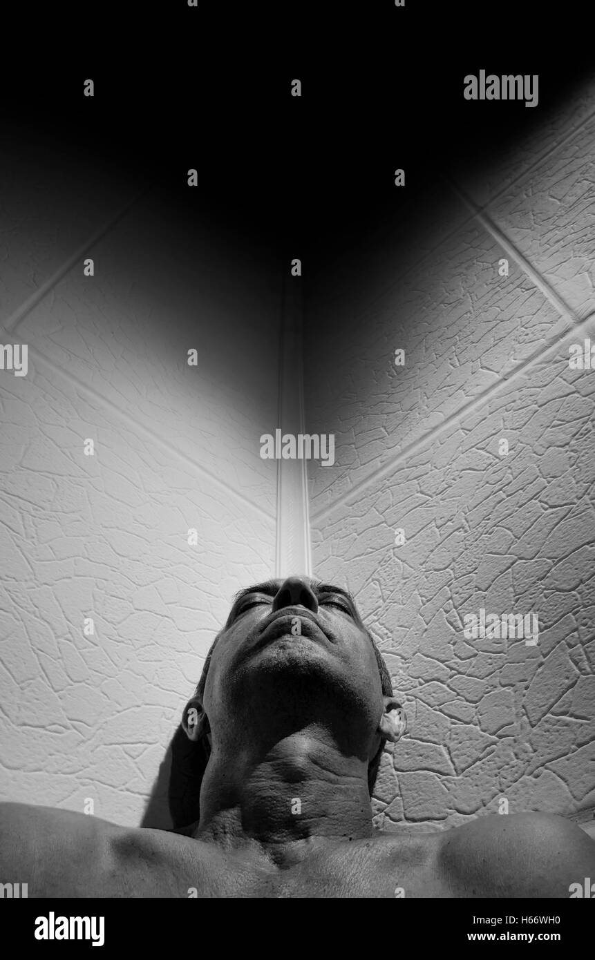 Man in corner of room hi-res stock photography and images - Alamy