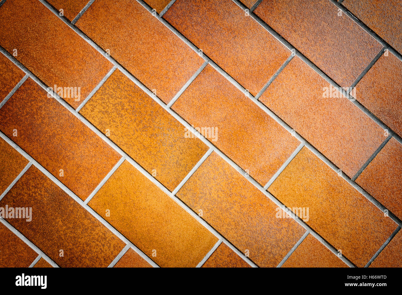 Detail of brown tile wall texture background Stock Photo - Alamy