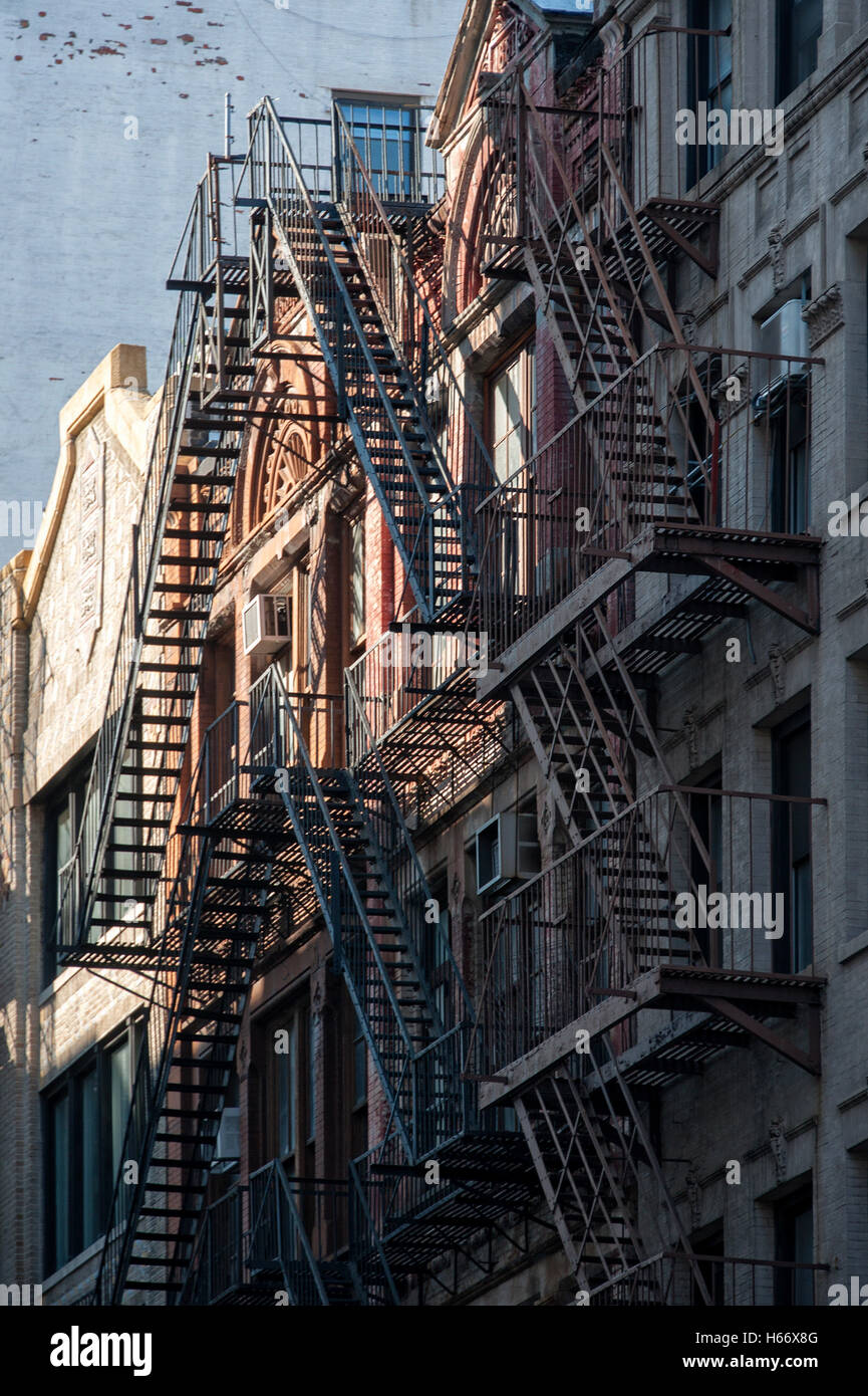 Fire escapes, building facades, Manhattan, New York City Stock Photo ...