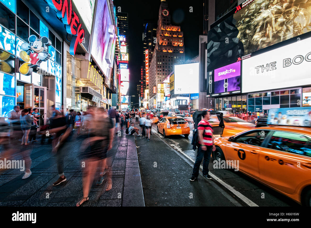 Busy Times Square at night, commerce, neon signs, Manhattan, New York ...