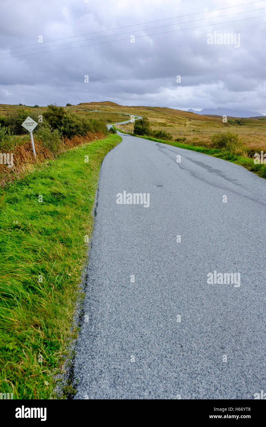 The narrow single track road of Isle of Skye Scotland needs passing ...