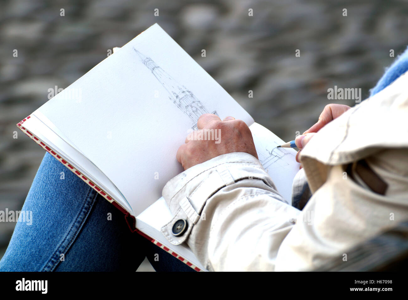 person who draws with pencil Stock Photo - Alamy