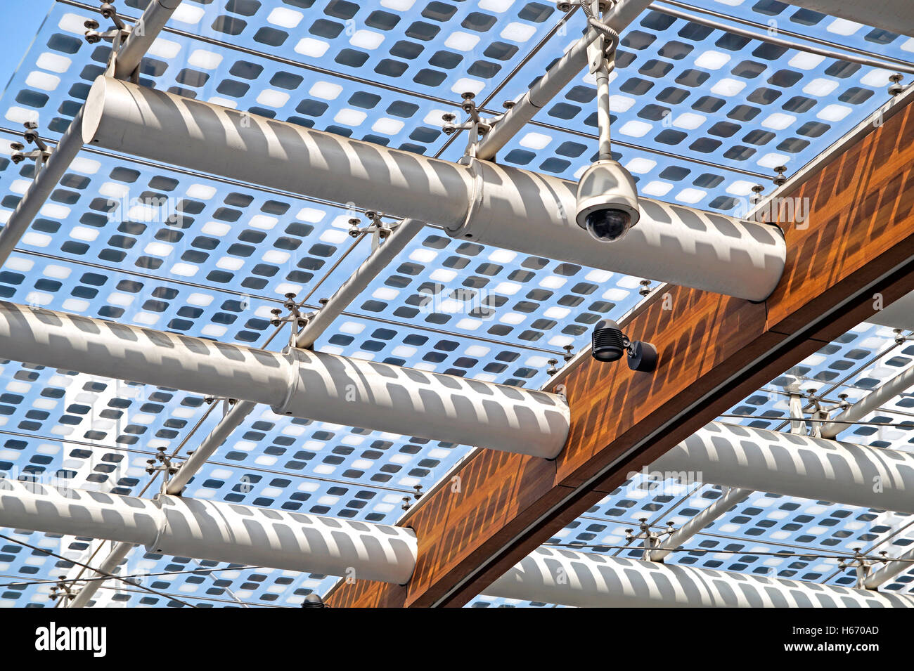 security camera under a roof modern Stock Photo - Alamy