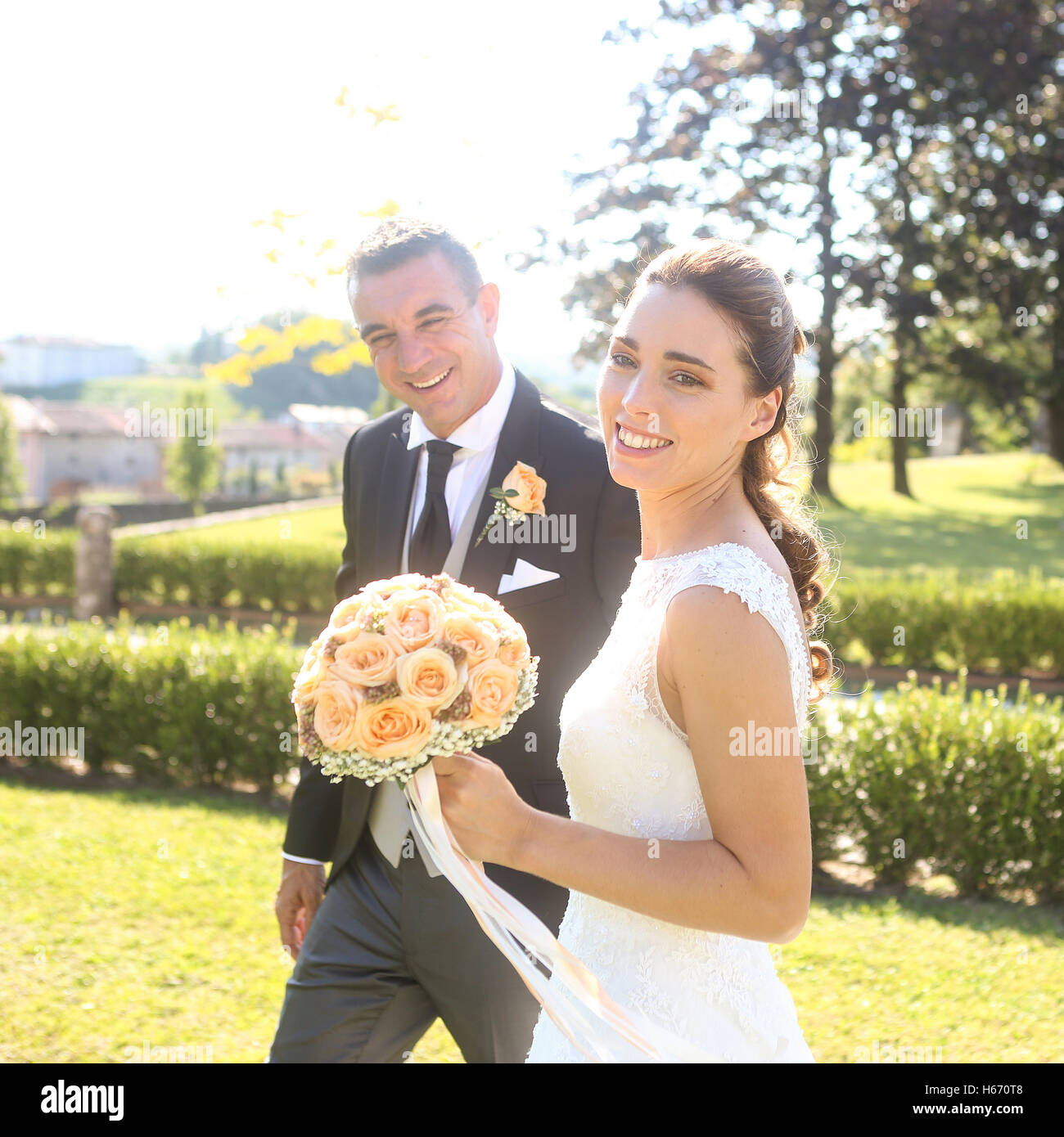 Happy bride and groom on their wedding day fabulous landscape Stock ...
