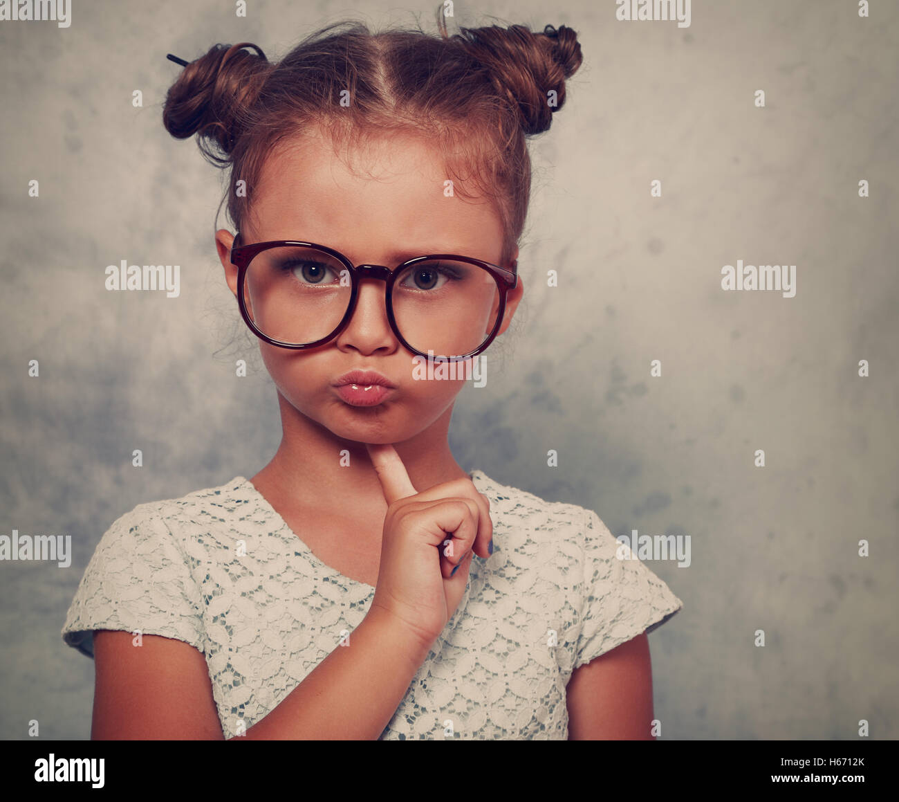 Child angry in glasses hi-res stock photography and images - Alamy
