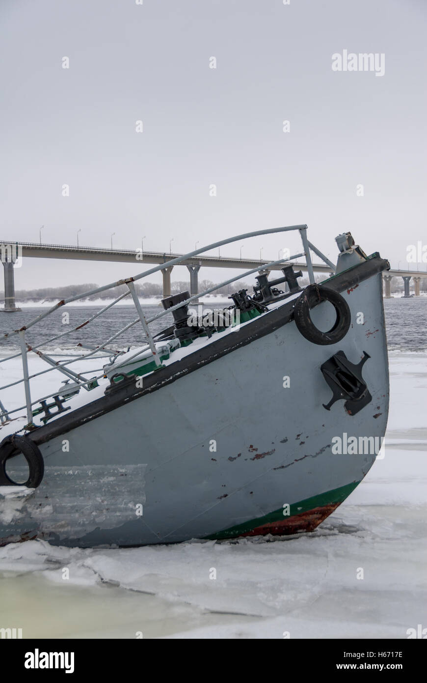 Sunken ship in a frozen river covered with ice Stock Photo - Alamy
