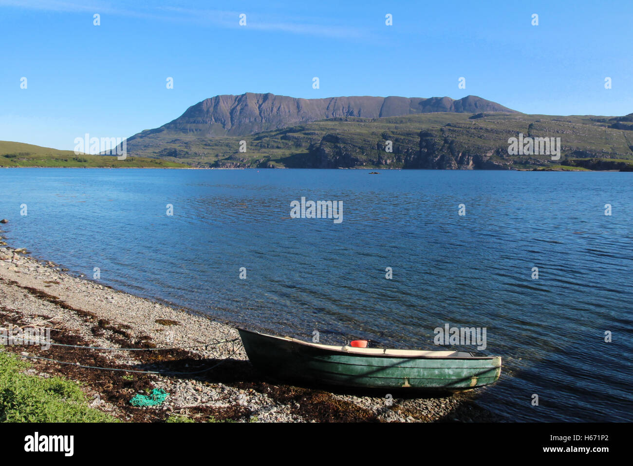 Stony Beach at the campsite on Ardmair Point, near Ullapool, Scotland ...