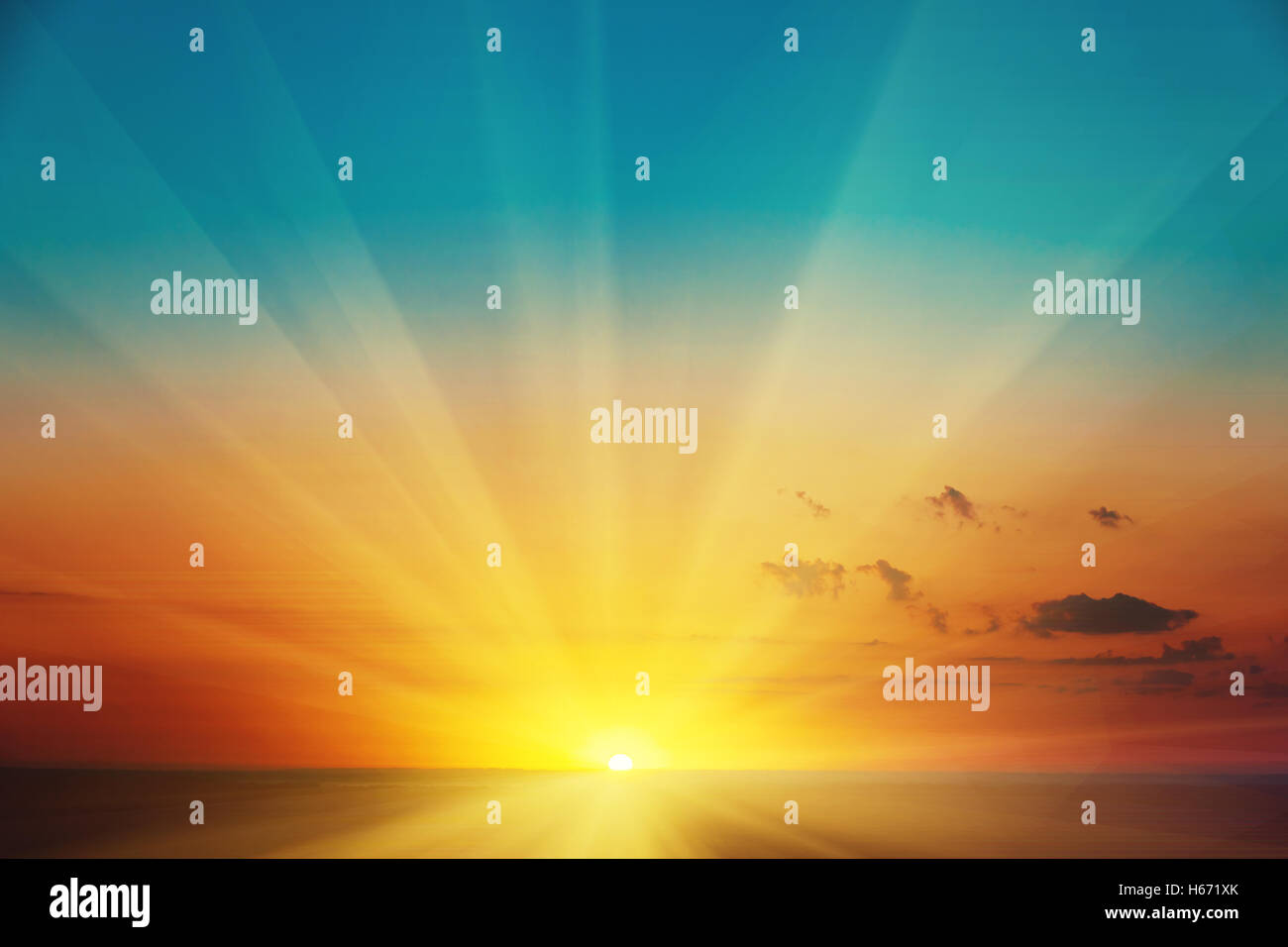 Beautiful blazing sunset landscape at over the meadow and orange sky ...