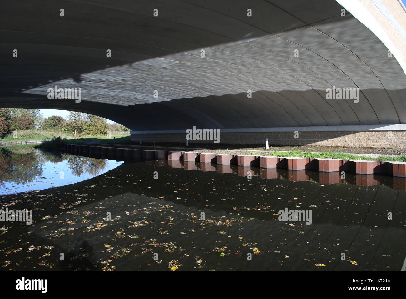 Lancaster Canal reflection onto Milestone Bridge of Bay Gateway Stock ...