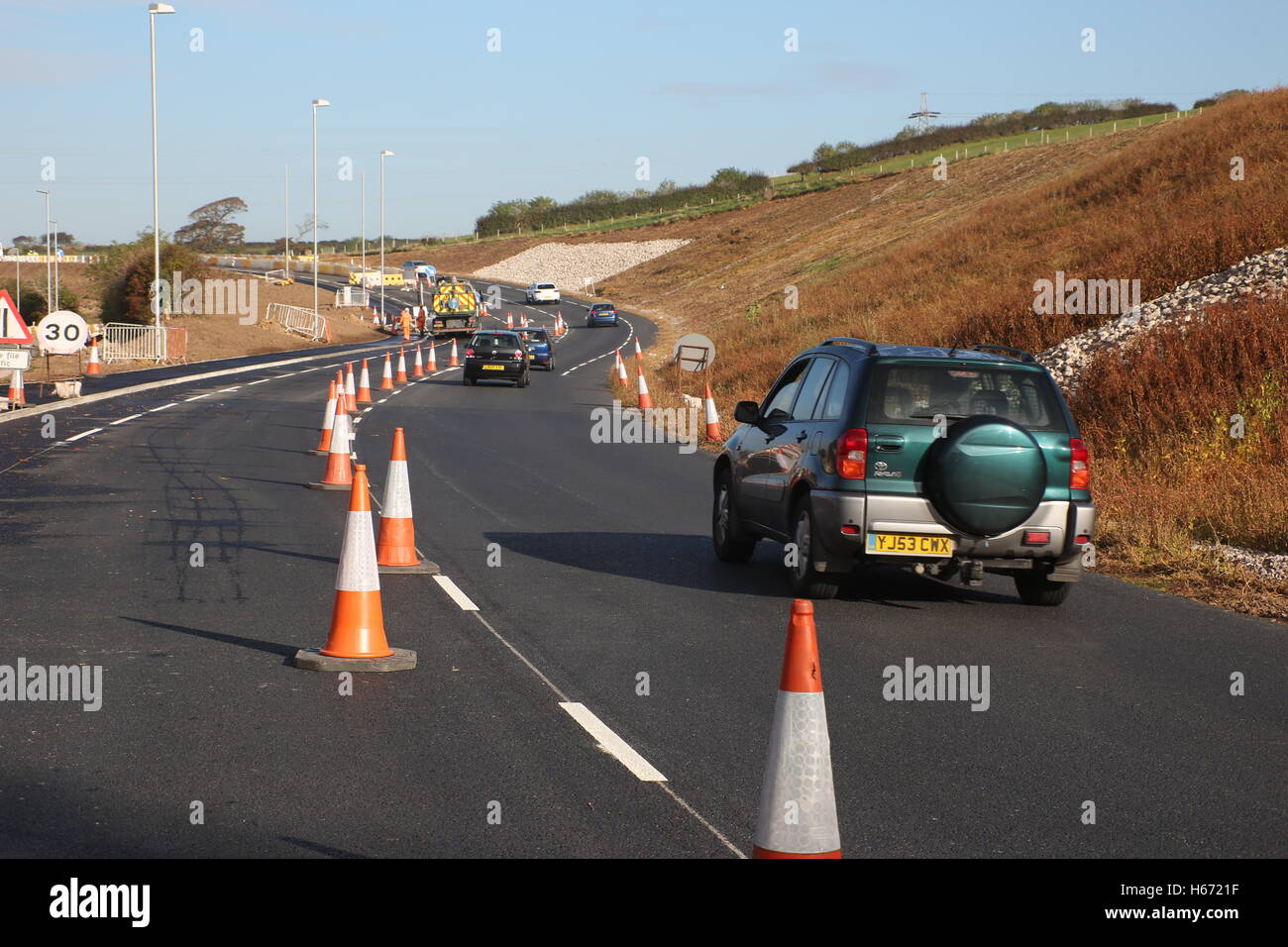 Slow traffic through roadworks Stock Photo - Alamy