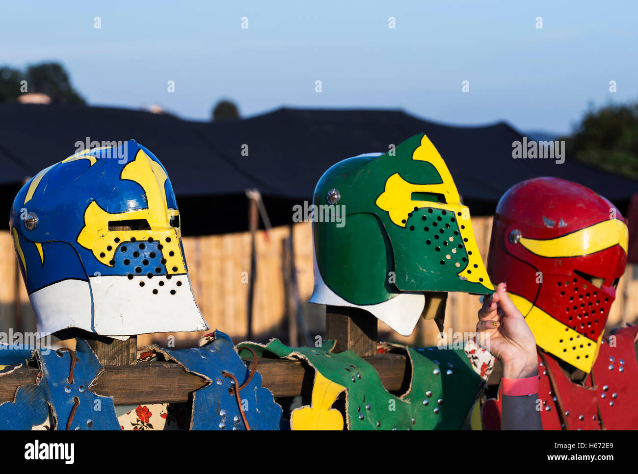 Hand is touching a Knights metal helmet Stock Photo - Alamy