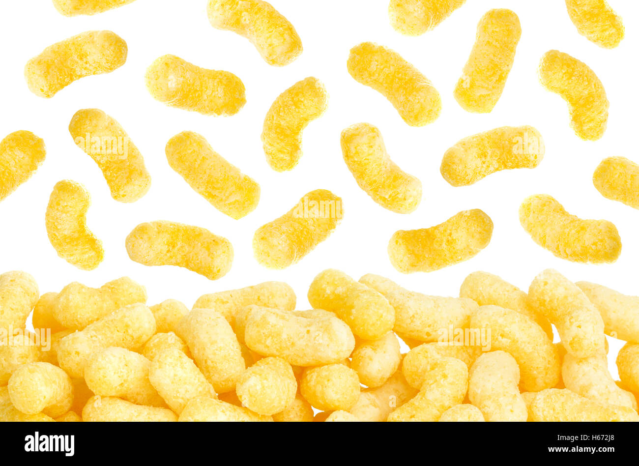 Crunchy corn sticks flakes isolated on white background Stock Photo - Alamy