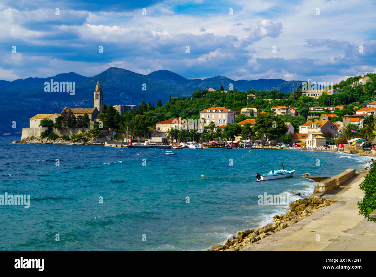 LOPUD, CROATIA - JUNE 27, 2015: Scene of the fishing port and the beach ...