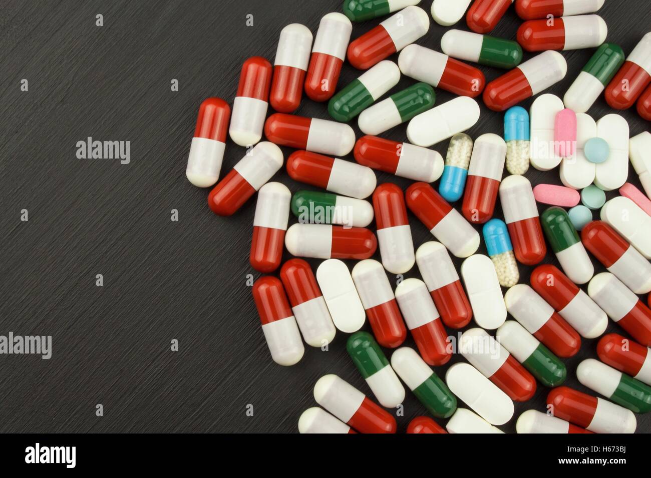 Detailed view of multicolored pills. Pharmaceutical industry. Colorful ...