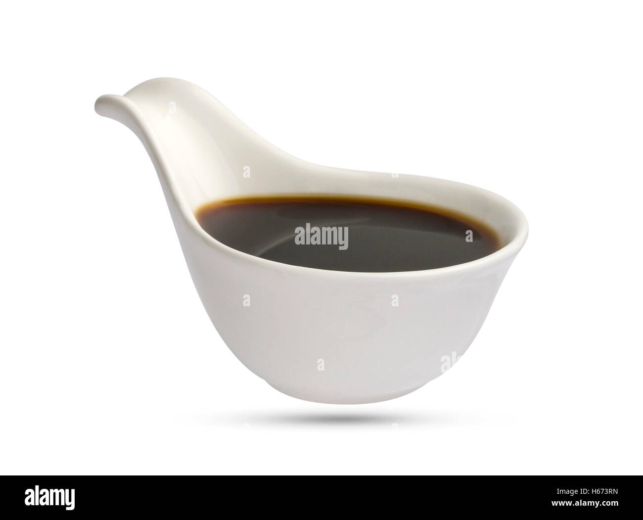 Dish of soy sauce isolated on white Stock Photo - Alamy