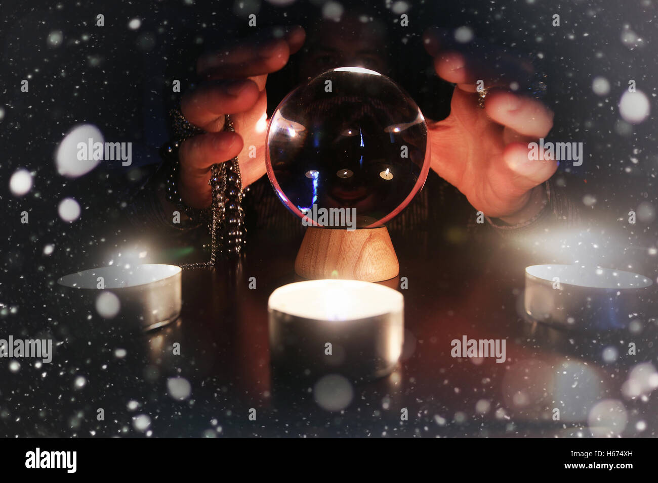 sorcerer hands over a transparent crystal ball fortune-telling for ...