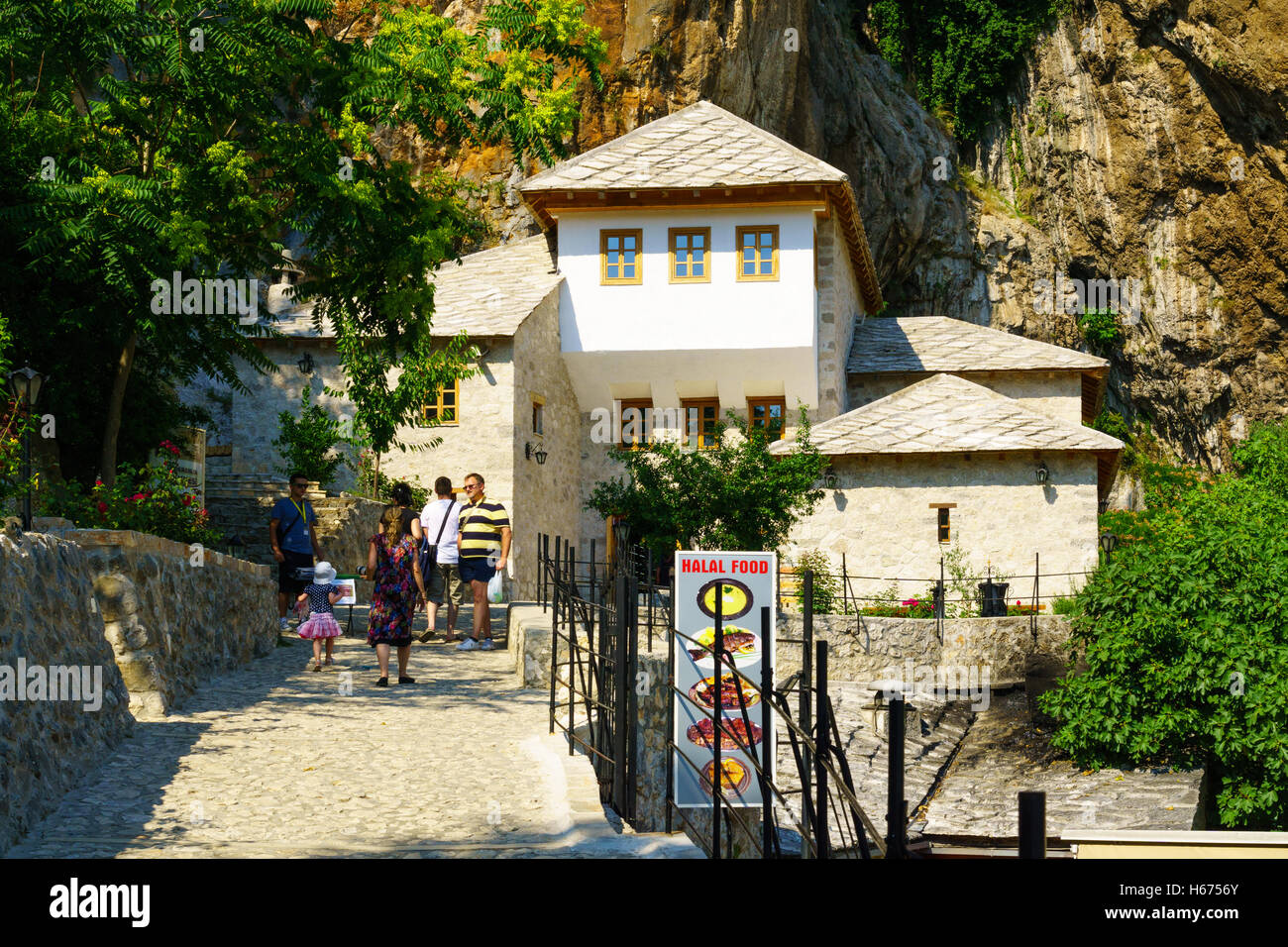 BLAGAJ, BIH - JULY 05, 2015: The Tekija, a Sufi Monastery, with locals ...