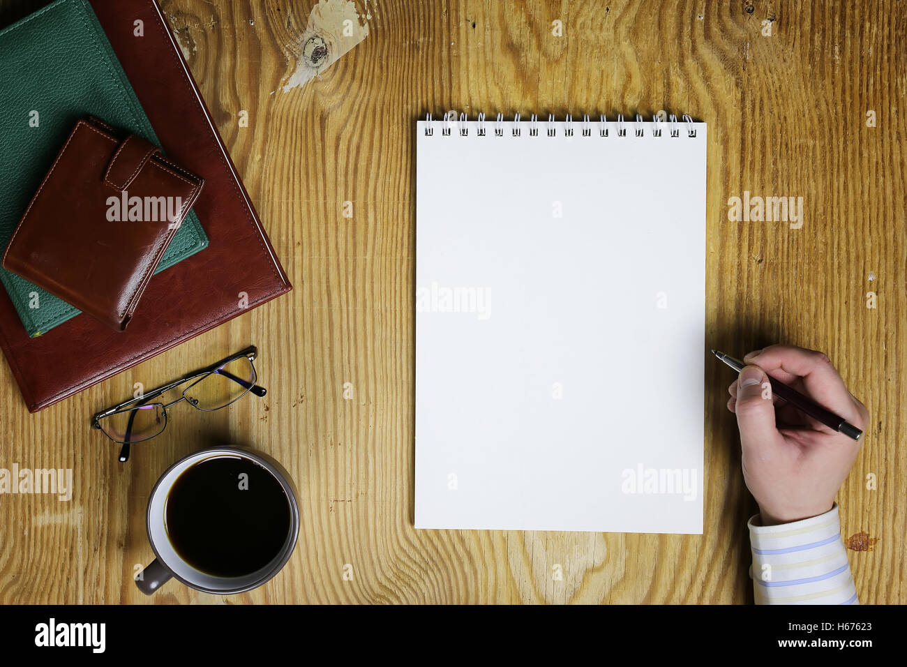 table write hand office view Stock Photo - Alamy