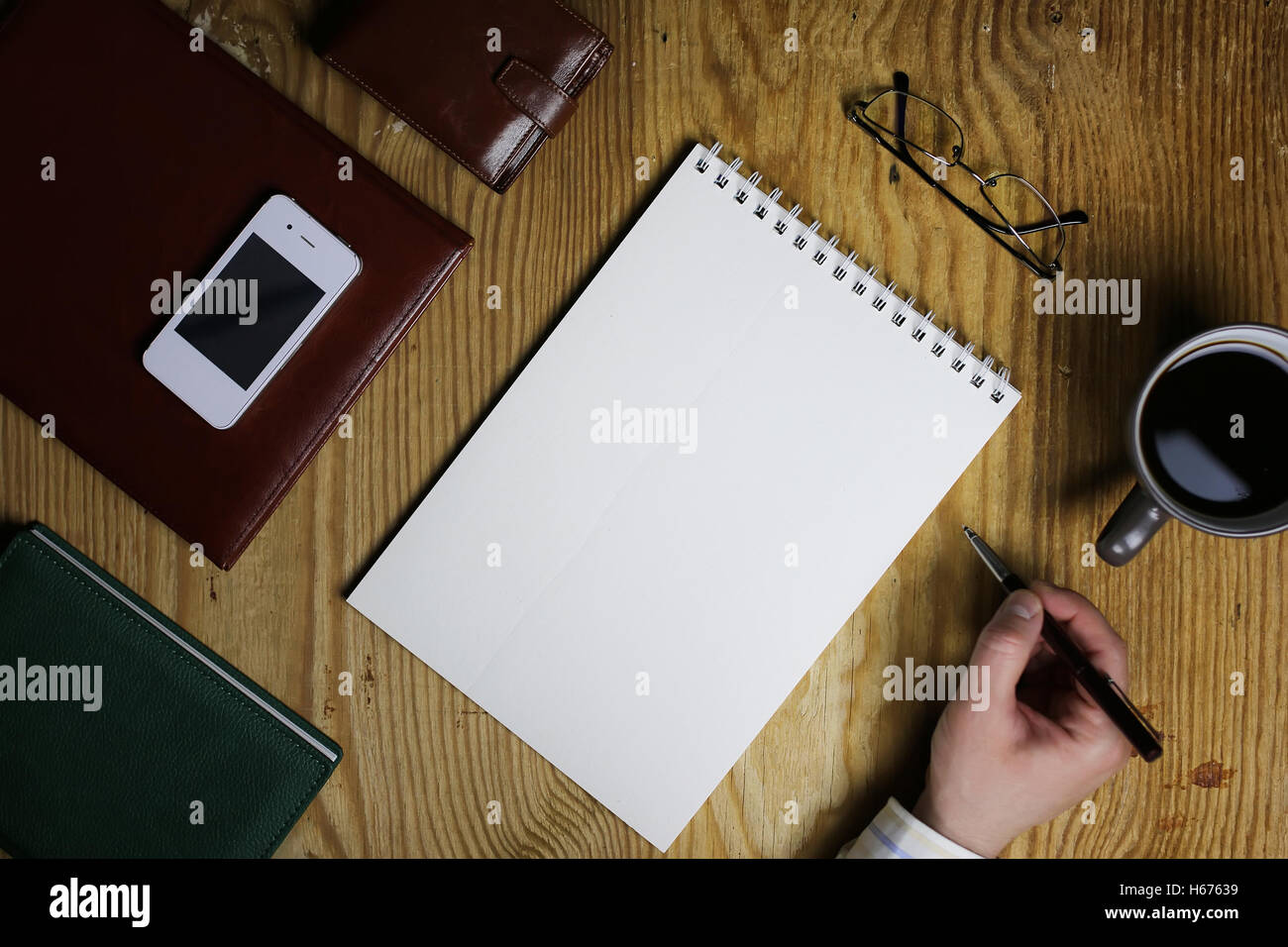 table write hand office view Stock Photo - Alamy