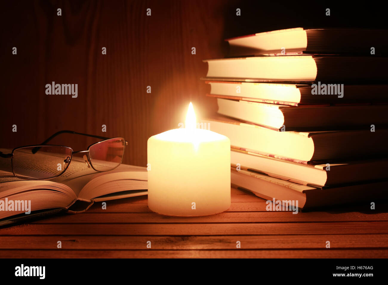 Reading Books By Candle Light High Resolution Stock Photography and ...
