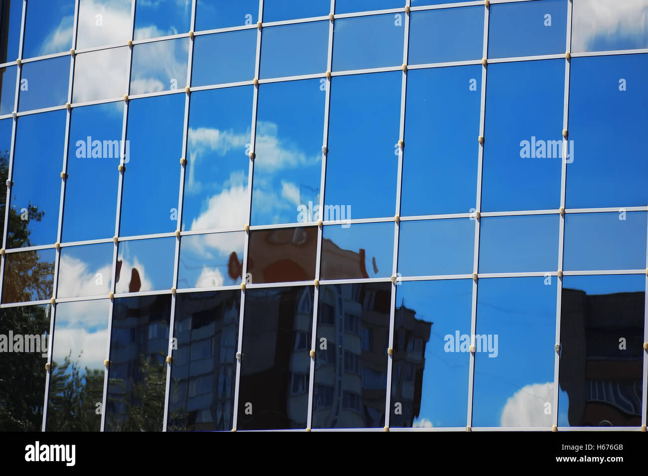 glass office building reflection sky cloud Stock Photo - Alamy
