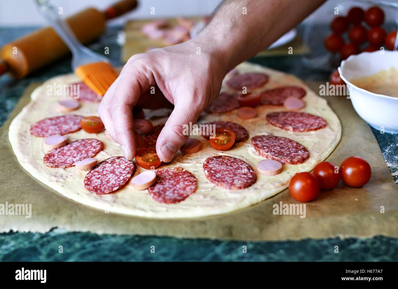 prepare pizza topping Stock Photo - Alamy
