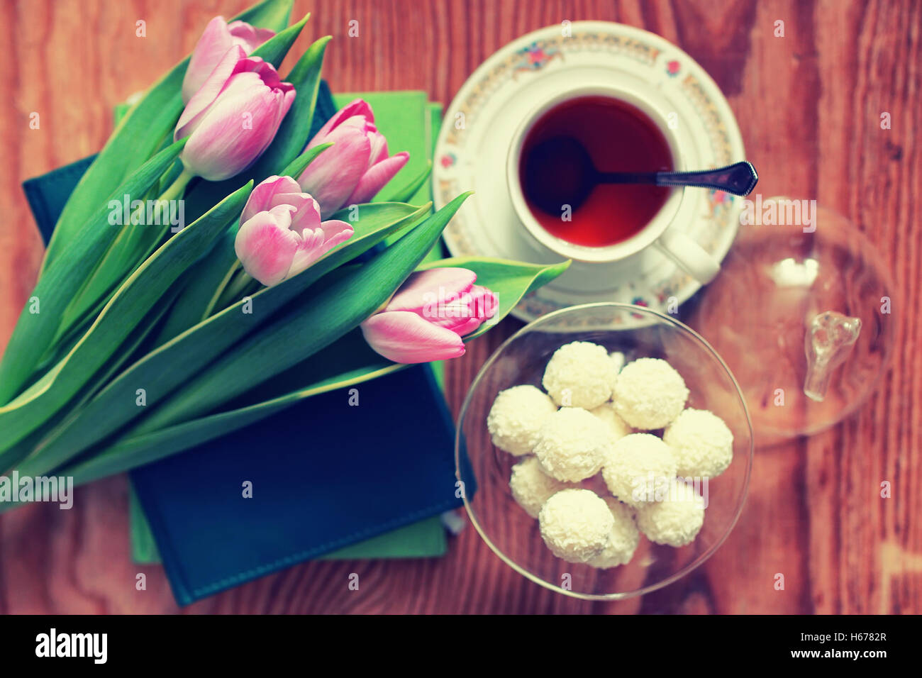 background wooden with tulip and tea Stock Photo - Alamy