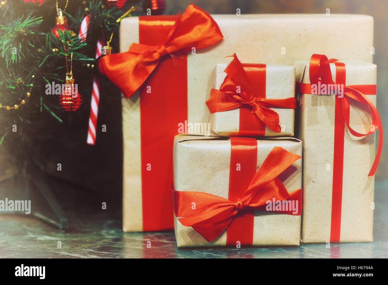 stack of gifts under a Christmas tree Stock Photo - Alamy