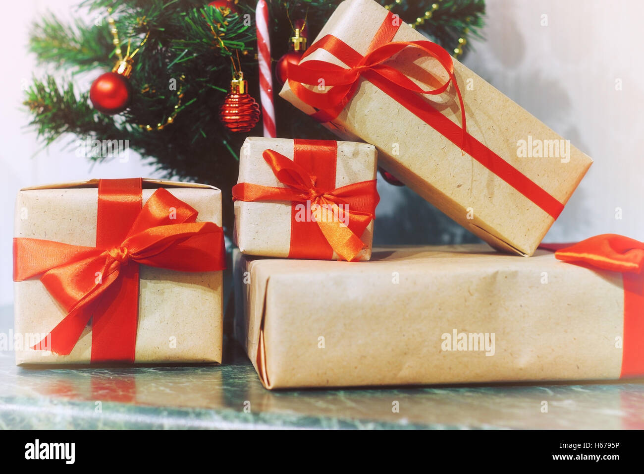 stack of gifts under a Christmas tree Stock Photo - Alamy