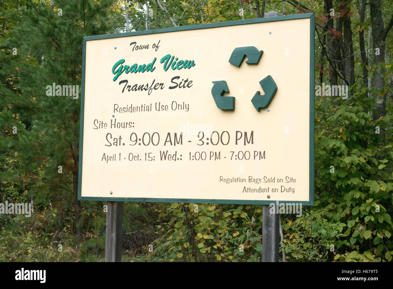 Sign for town of Grand View Transfer Site, filled with bins for every ...
