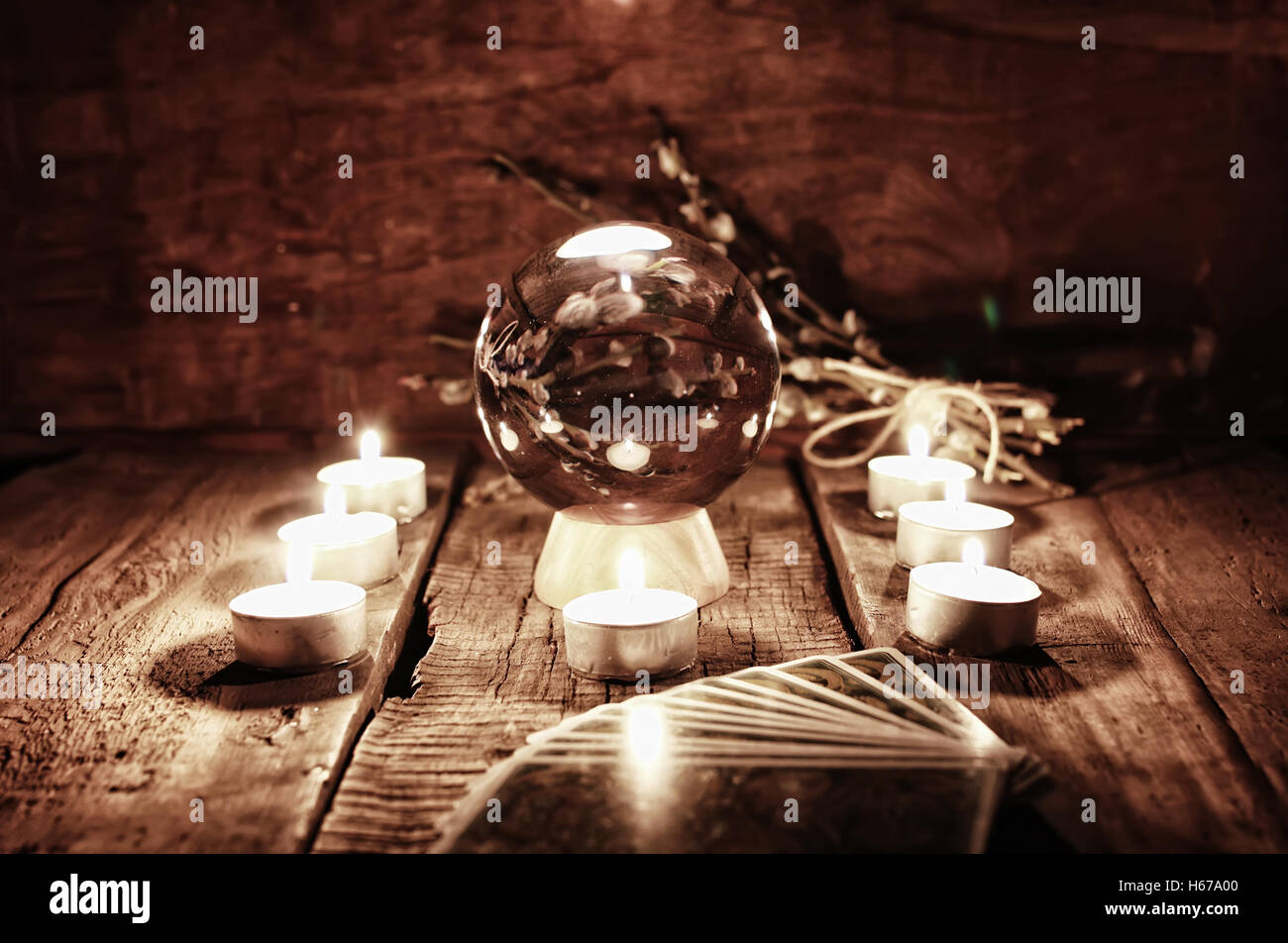future teller candle divination Stock Photo - Alamy