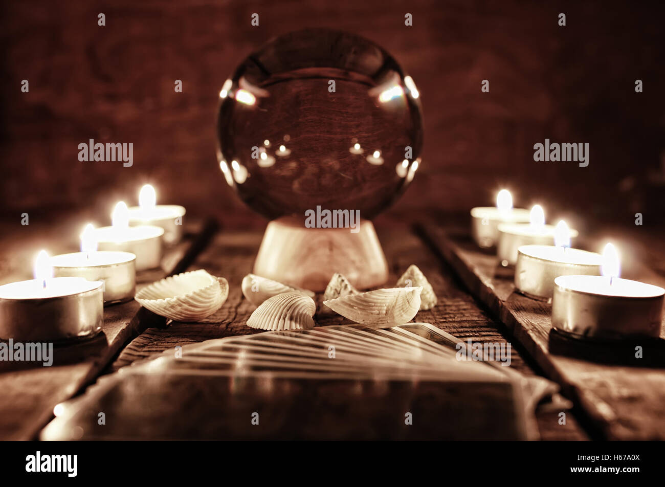 future teller candle divination Stock Photo - Alamy