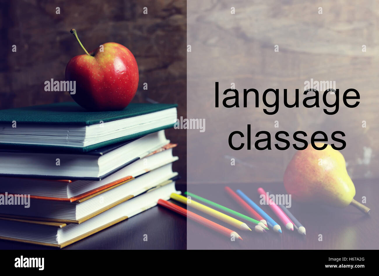 language classes apple book stack Stock Photo - Alamy