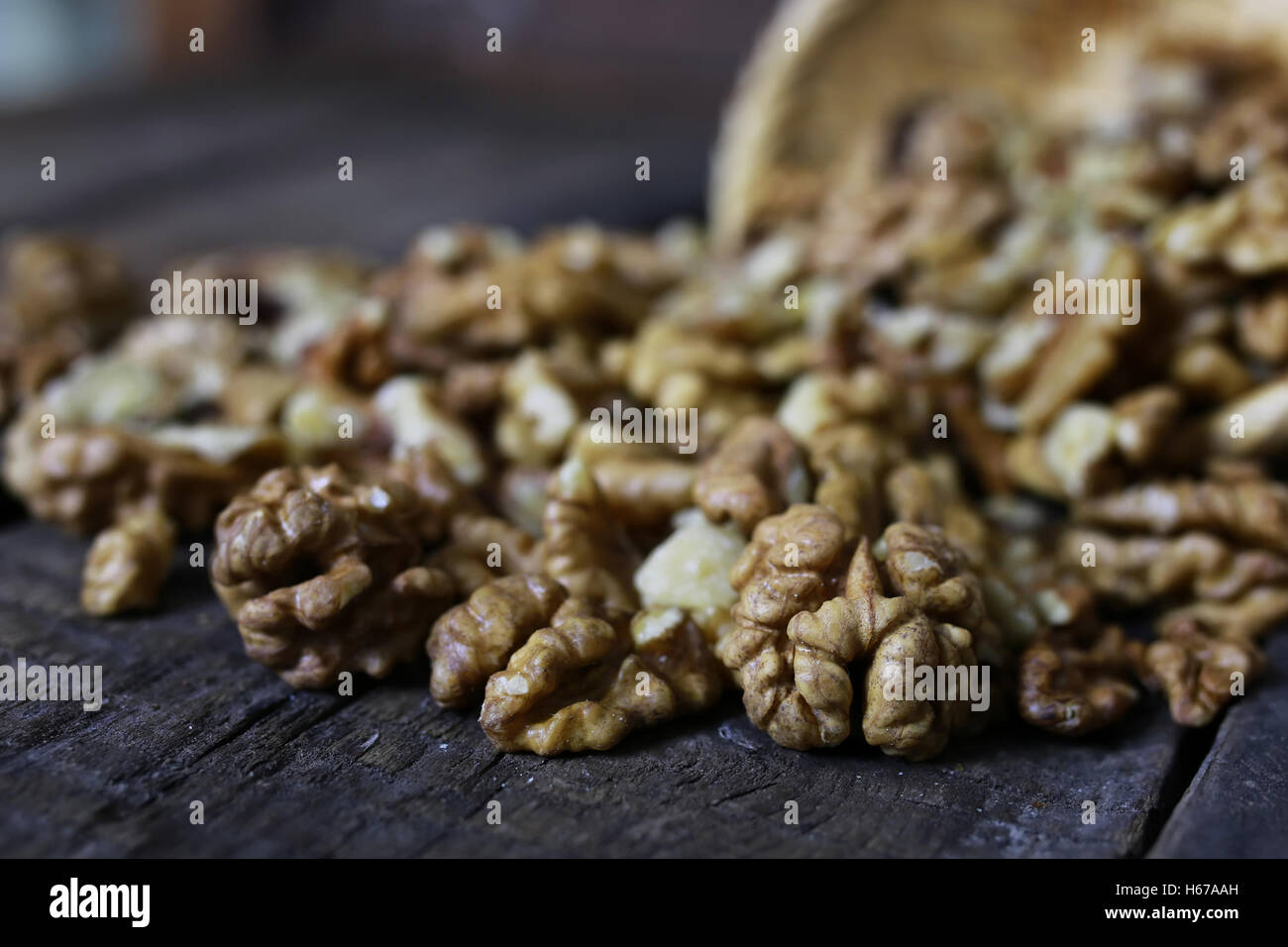 peeled walnut on a wooden background Stock Photo - Alamy