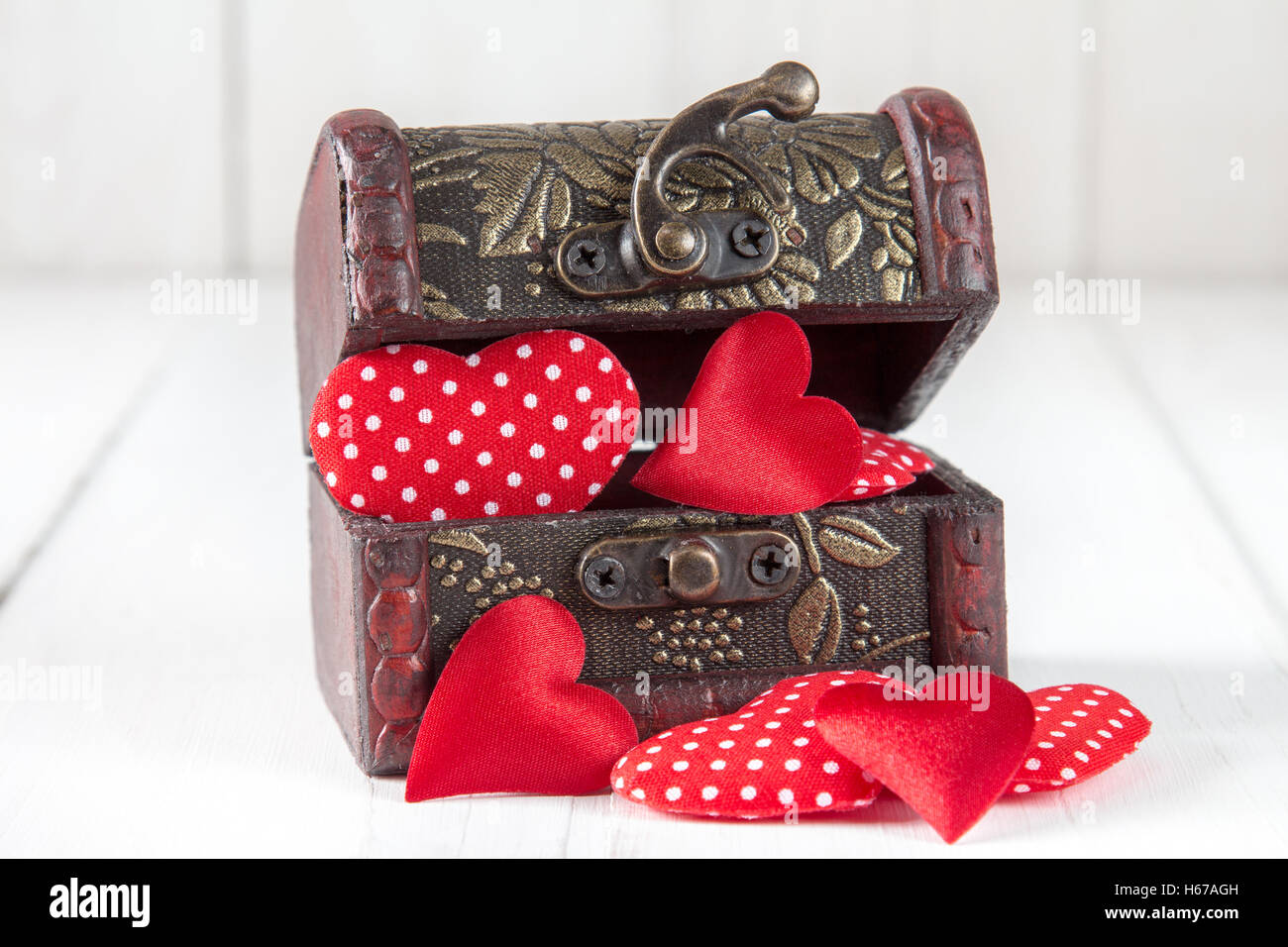 Open wooden box with a cute little hearts inside Stock Photo - Alamy