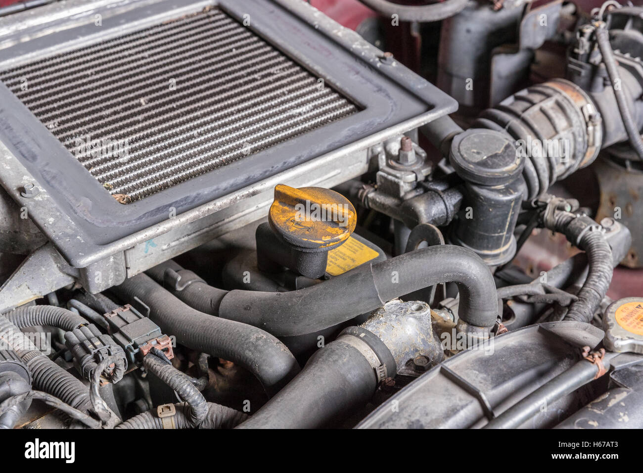 Section of a car engine underneath the bonnet Stock Photo - Alamy