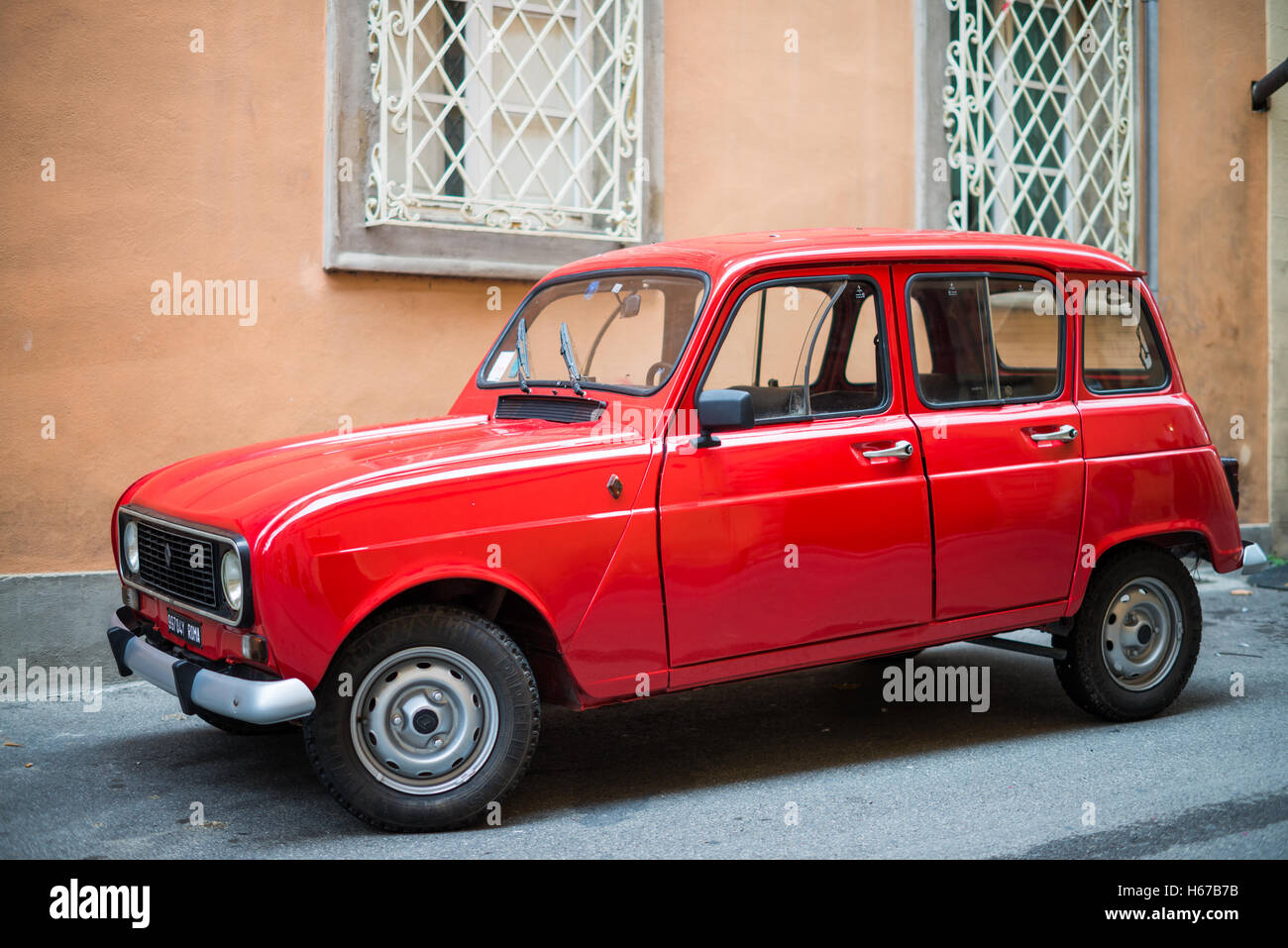 red Renault 4 in the street of the Volterra, Tuscany, Italy, EU, Europe ...