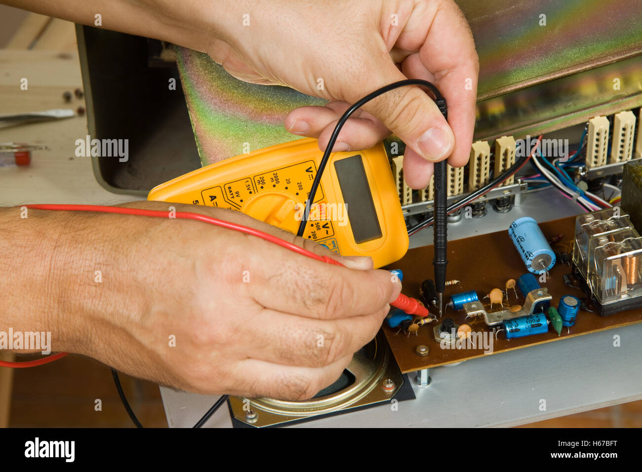 electrician repairing some electric appliance Stock Photo - Alamy