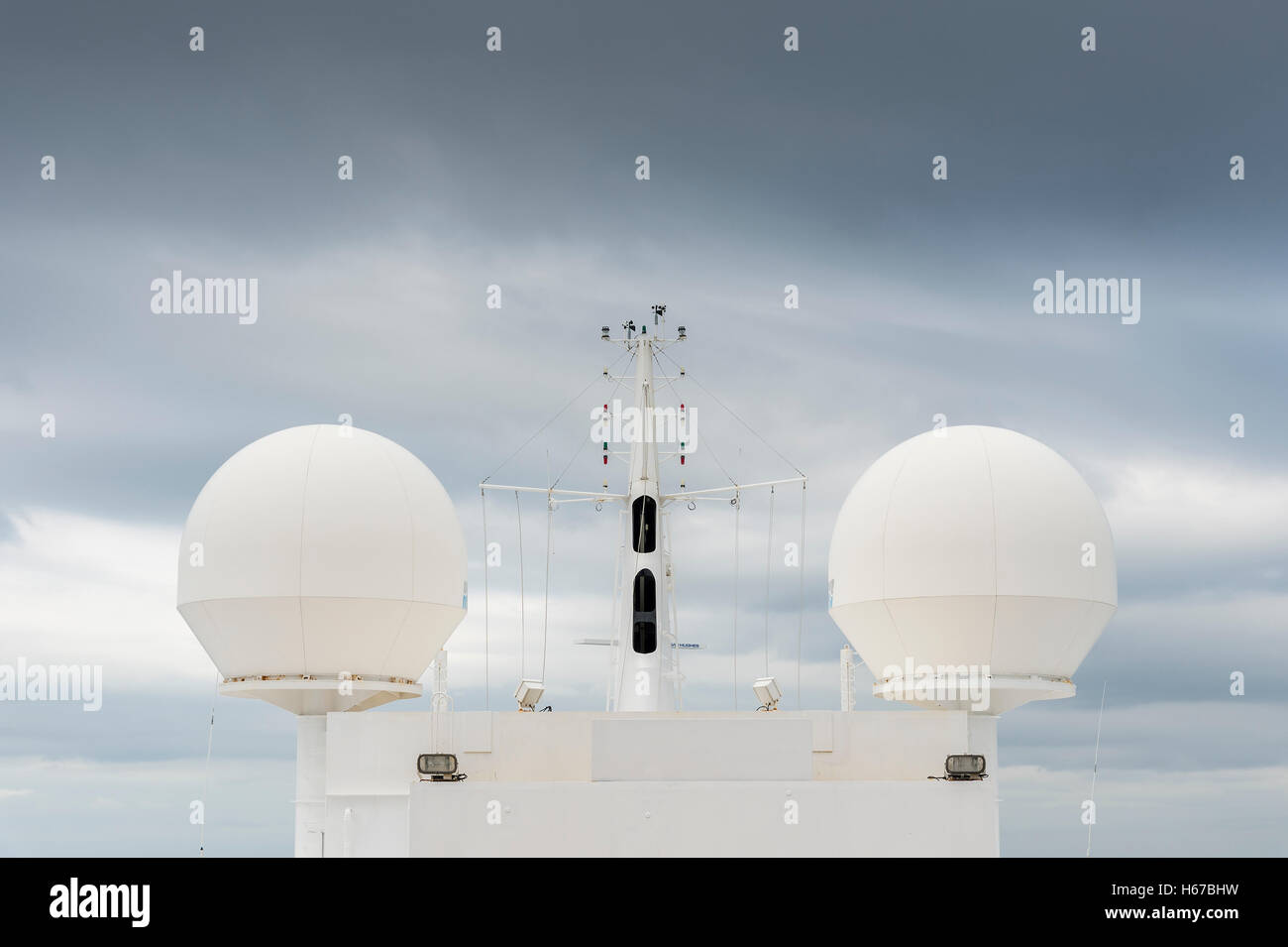 Superstructure of the RMS Queen Mary 2 showing radar globes and mast ...
