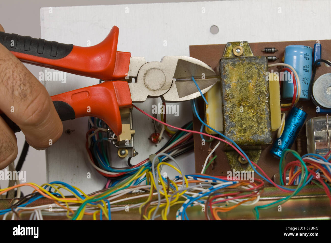 electrician repairing some electric appliance Stock Photo - Alamy