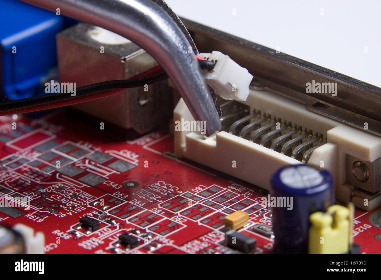 electrician at work with an electric device Stock Photo - Alamy
