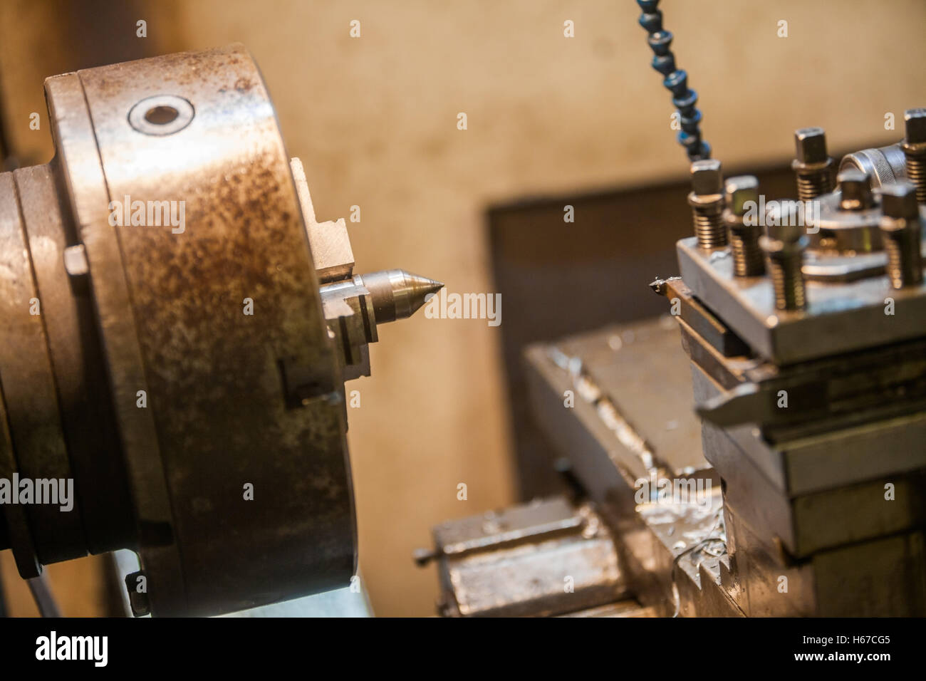 Color image of an old lathe in a workshop Stock Photo - Alamy