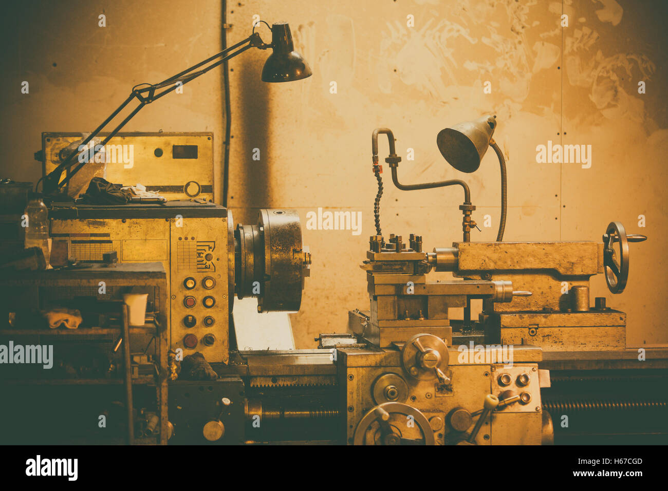 Color image of an old lathe in a workshop Stock Photo - Alamy
