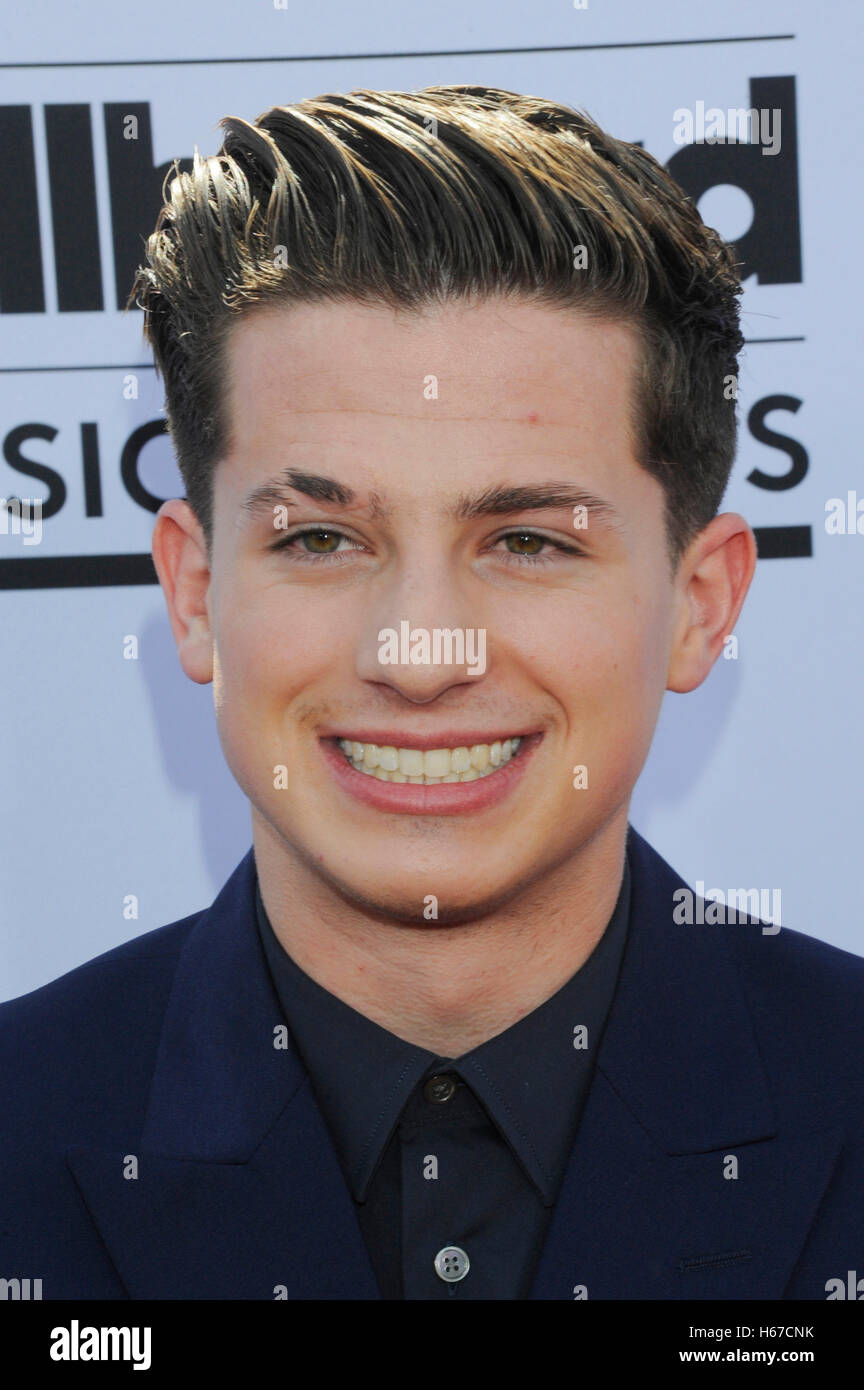 Singer Charlie Puth arrives at the 2015 Billboard Music Awards at the ...