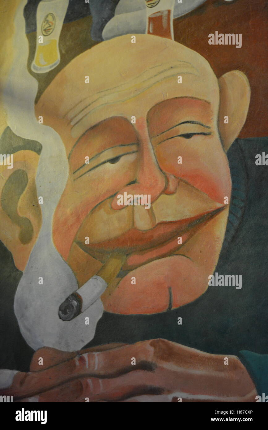 Mural of a man smoking Stock Photo - Alamy