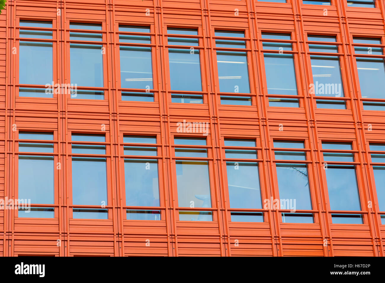 Orange fronted office building in the city Stock Photo - Alamy