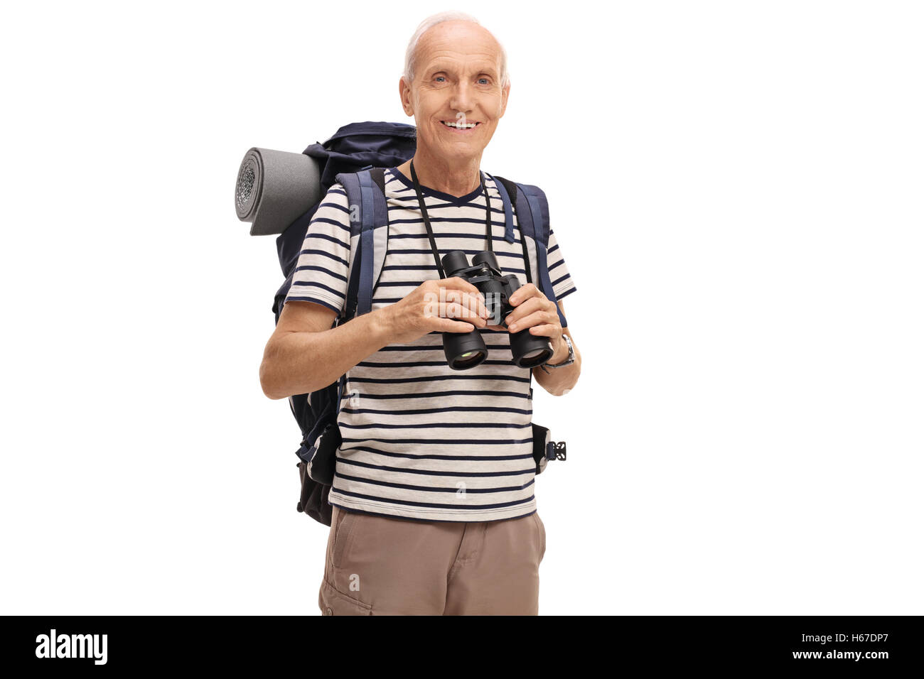 Mature hiker holding a binoculars and looking at the camera isolated on ...