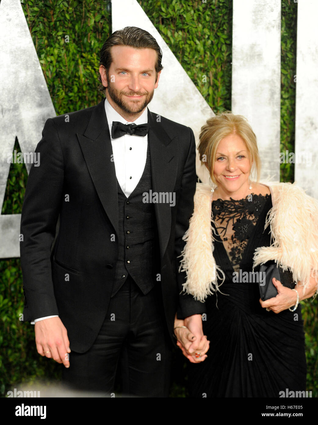 Bradley Cooper and Gloria Cooper arrive for the 2013 Vanity Fair Oscar ...