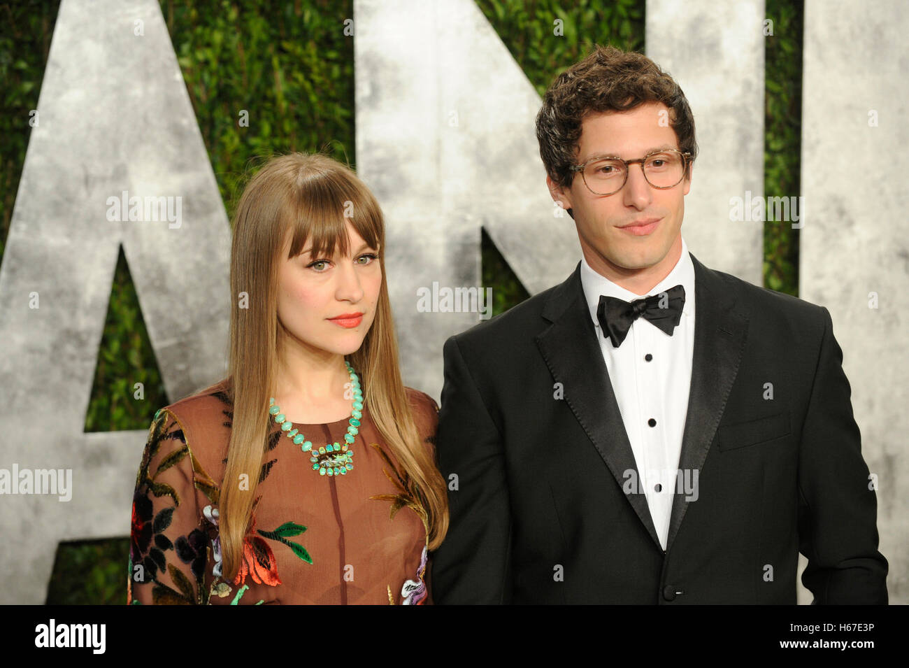 Andy Samberg, Joanna Newsom arrive for the 2013 Vanity Fair Oscar Party ...
